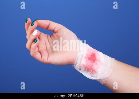 Hand with blood and bandage Stock Photo - Alamy
