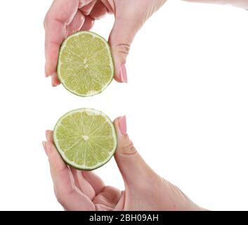 Female hands squeezing lime isolated on white Stock Photo - Alamy