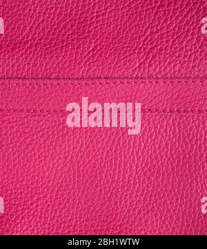 natural bright pink cowhide texture, full frame, scarlet color, close ...