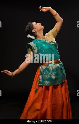 Graceful kathak dancer performing over a white background Stock Photo ...
