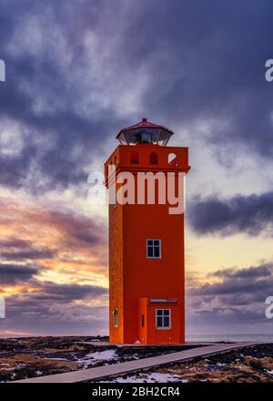 Orange lighthouse at Svörtuloft, Iceland Stock Photo - Alamy