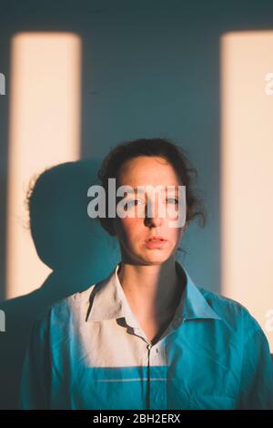 Portrait of sad woman at home Stock Photo - Alamy