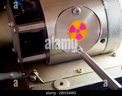 Opening the cover of Radioactive container in the part of machinery ...