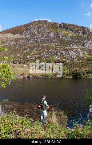 Fishing in the Gap of Dunloe, Ring of Kerry, County Kerry, Eire Stock ...