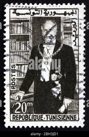 TUNISIA - CIRCA 1960: a stamp printed in Tunisia shows View of Skanes ...