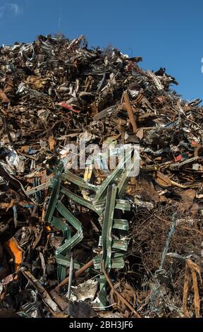 A heap of twisted metal, a scrap metal yard, a collection of objects ...