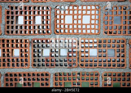 Perforated cement block wall background with shadow Stock Photo - Alamy
