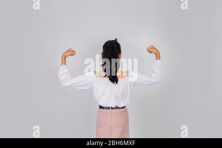 The backside of an Asian girl is pulling her bicep muscles Stock Photo ...