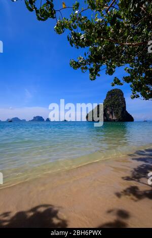 Riley beach with golden sand, karst rocks and turquoise sea on a sunny ...