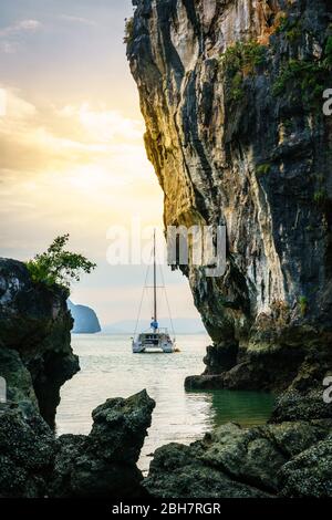 Vibrant sunset with sailing boat anchored in the Baltic Sea off the ...