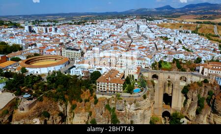 Aerial view of Tajo Gorge and Ronda Puente Nuevo Bridge at sunset ...