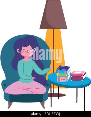 I stay at home. Girl sitting in a armchair near the window in the home ...