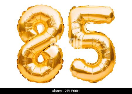 Number 85 gold birthday celebration balloon on a confetti glitter ...