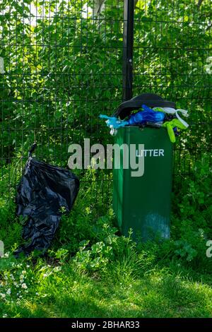 A dog litter bin full and overflowing on the West Wittering beach near ...