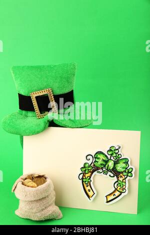 green clover leaves and a bag of gold - symbol of St. Patrick's Day ...