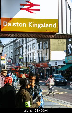 London. Hackney. Dalston Kingsland station. Older black woman, wearing ...