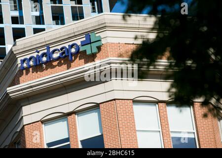 A logo sign outside of the headquarters of MidCap Financial Services in Bethesda, Maryland on ...
