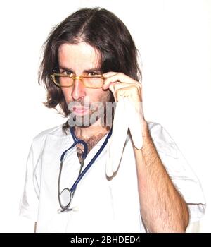 a mad doctor injecting a medicinal Stock Photo - Alamy