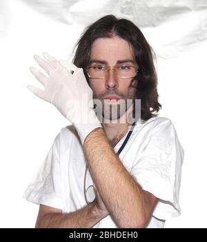 a mad doctor injecting a medicinal Stock Photo - Alamy