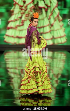 SEVILLA, SPAIN - JAN 30: Model wearing a dress from the Bajo el Soul de ...