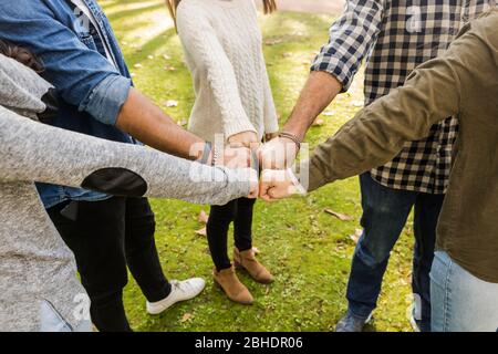 Joining forces. High angle shot of two groups of business teams meeting ...