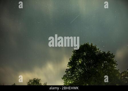 The long exposure of the Starlink satellites in the sky - starry night ...