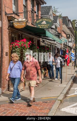 Visitors to Concord, MA walking by the Main Street Market and Cafe ...