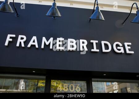 A logo sign outside of a Framebridge retail store location in Bethesda ...