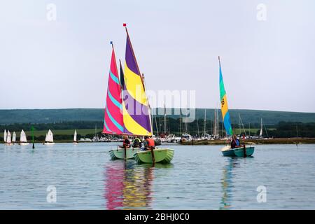 Scows racing on the River Yar, Isle of Wight, in very light weather ...