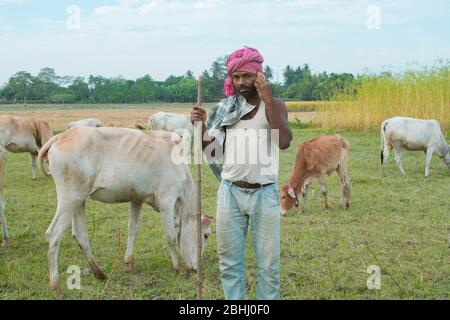 farmer listening radio in rural part of india Stock Photo - Alamy