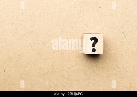 Alphabet letter block in question mark sign on wood background Stock ...