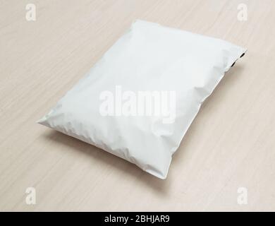 Blank black plastic crumpled packet isolated on white background Stock ...