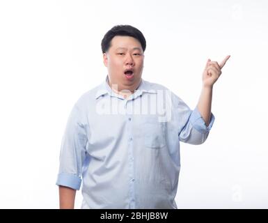 fat man pointing at his belly isolated on white background Stock Photo ...
