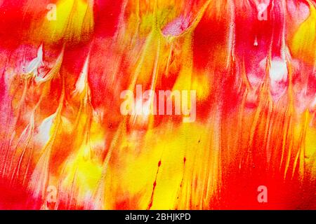 Colorful yellow, orange and red watercolor wet brush paint liquid ...