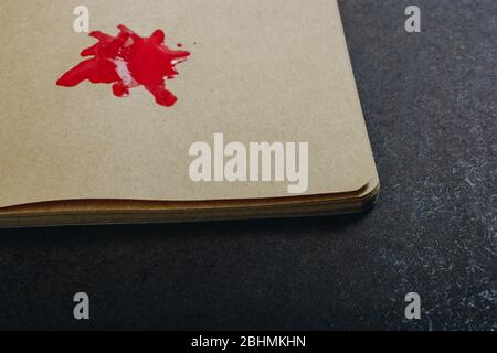 Blood splatter painted on yellow paper Stock Photo - Alamy