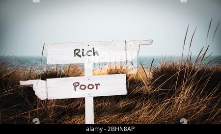 Street Sign the Direction Way to Rich versus Poor Stock Photo - Alamy