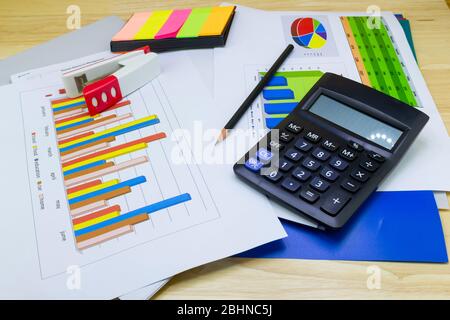 business paper graphs calculator pencil with charts report, concept ...