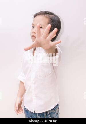 Kids protection, bullying, abuse and violence concept. Child making ...