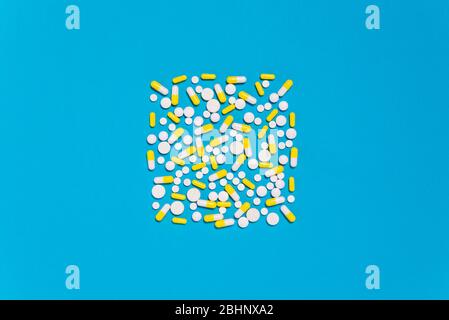 Composition with colorful pills on white background Stock Photo - Alamy