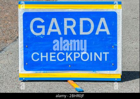 Irish Police An Garda Siochana road block with signs and barriers Stock ...