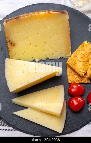 Spanish tapas, manchego cheese made from sheep milk and green olives ...