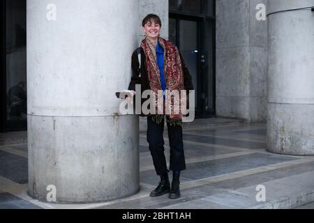 A chic showgoer attending the Victoria/Tomas show during Paris Fashion ...