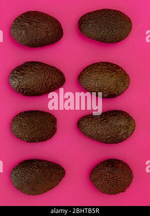 Group of avocado seen on a colourful background from above Stock Photo ...