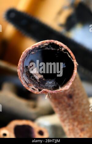 Closeup image of rusty metal pipes Stock Photo - Alamy