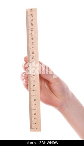 Female hand with wooden ruler isolated on white Stock Photo - Alamy