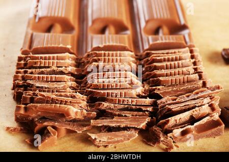 Chopped chocolate on parchment, closeup Stock Photo - Alamy