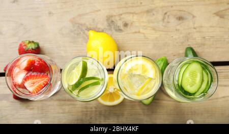 Glasses of different home made freshness healthy vitamin-fortified ...