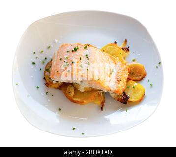 Deliciously steak of fried salmon with potatoes and mushrooms Stock ...