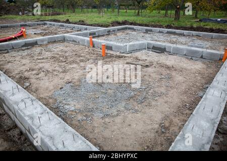 Foundations of the house, unfinished bungalow, rough construction ...