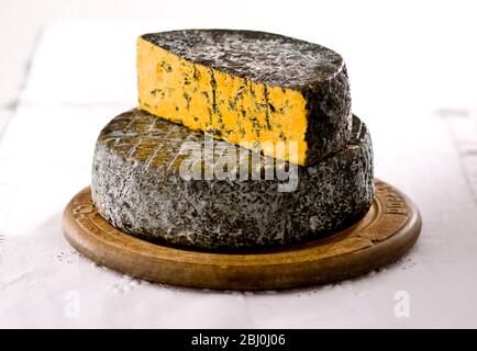Blacksticks Blue cheese from Lancashire UK, with grapes, red wine, and ...